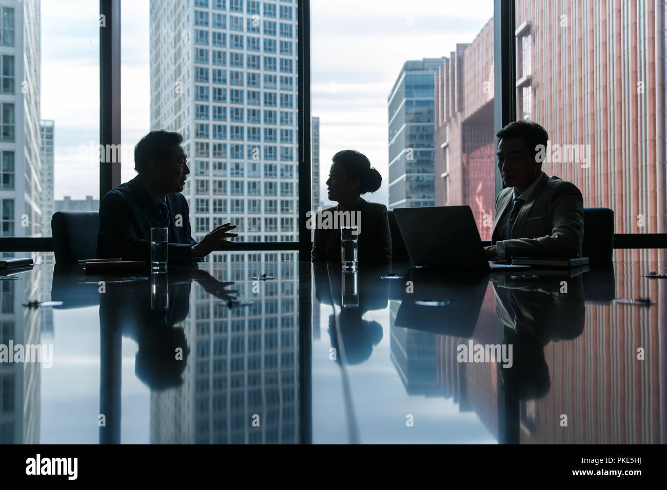 Business men and women in the conference room Stock Photo - Alamy
