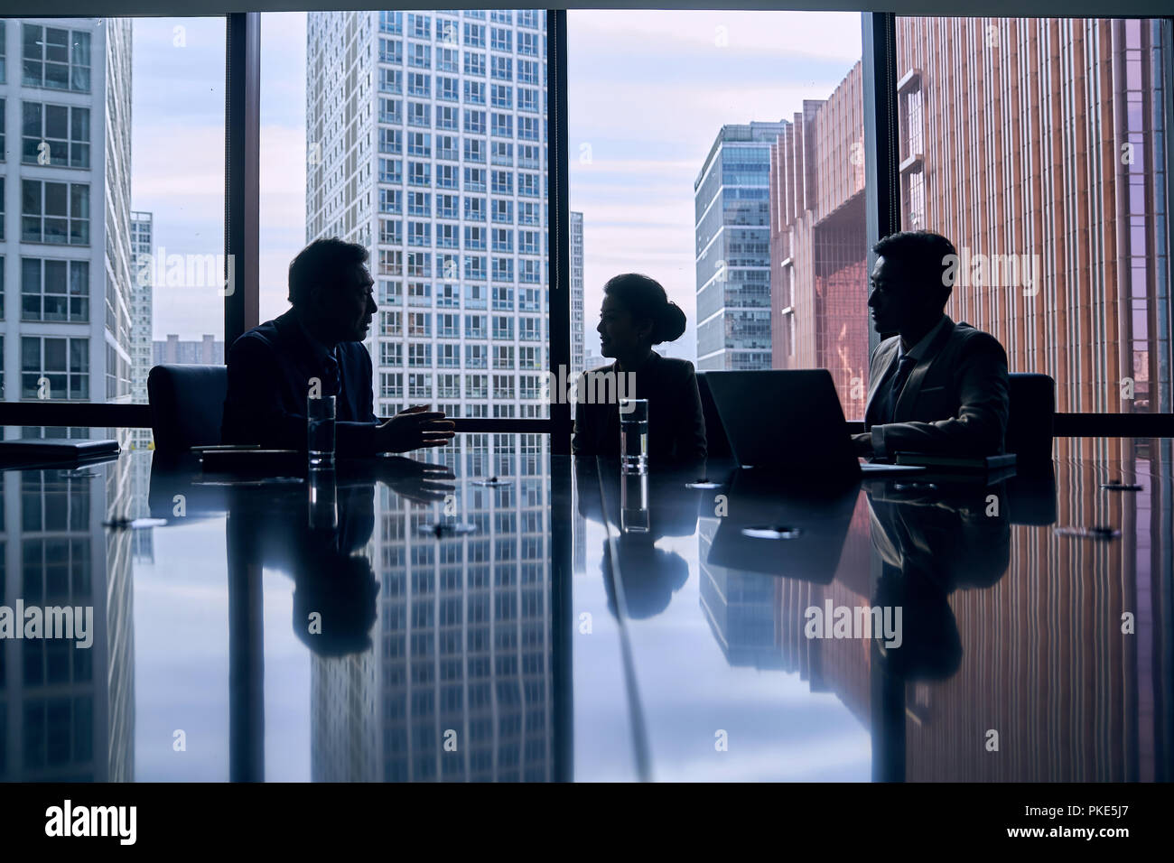 Business men and women in the conference room Stock Photo - Alamy