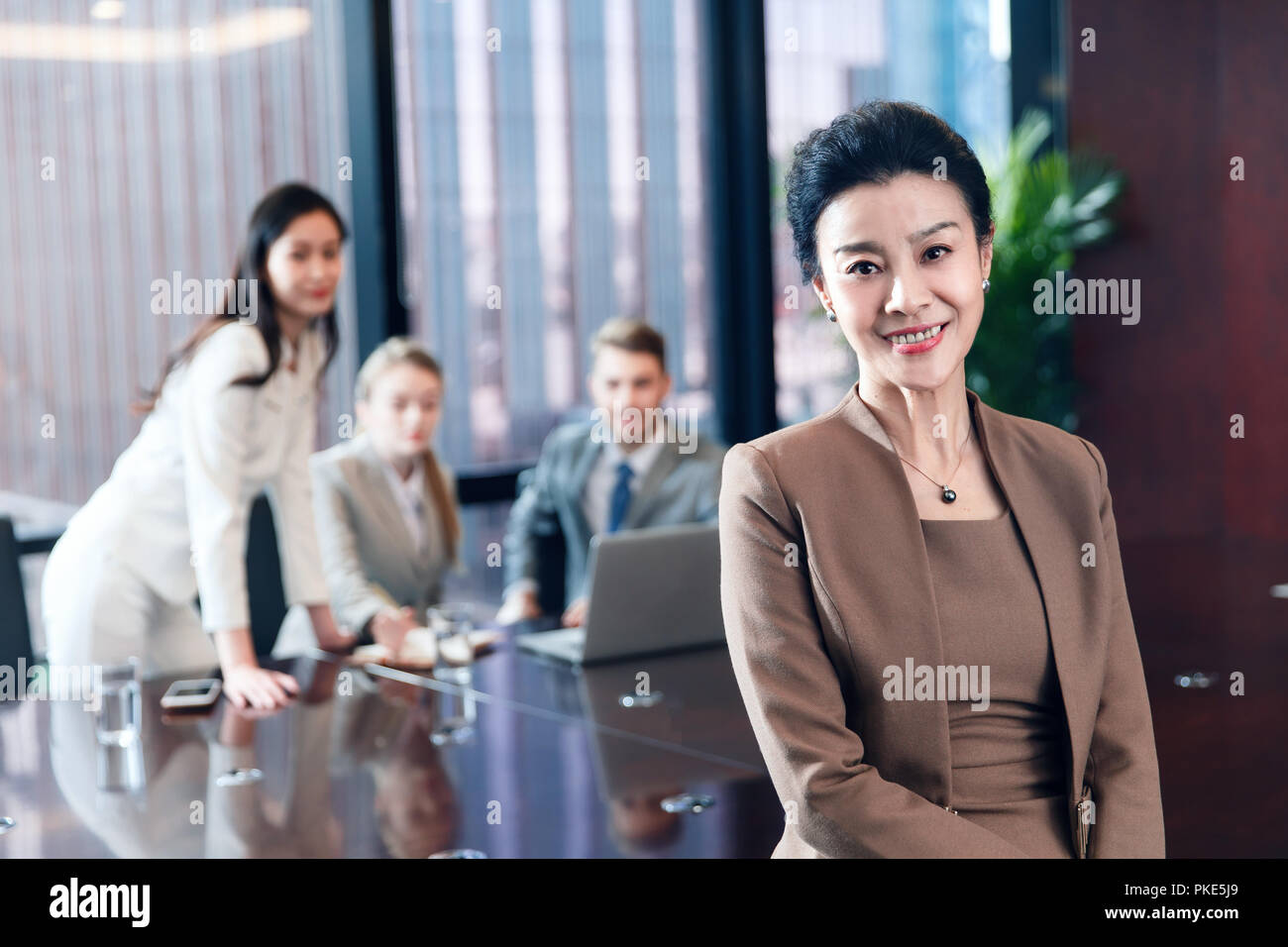Business men and women in the conference room Stock Photo - Alamy