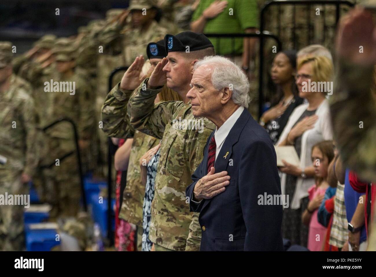 Anthony Keating, civilian aide to the Secretary of the Army, holds his ...
