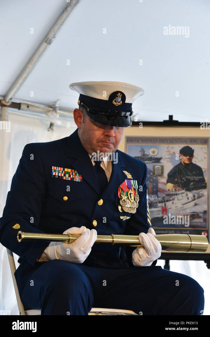 Chief Petty Officer Joseph Ruggiero looks over the long glass while the ...