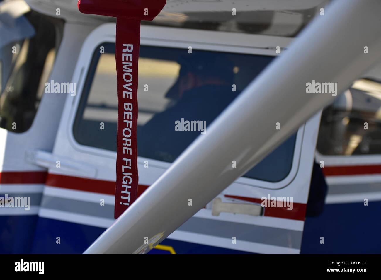 A Civil Air Patrol pilot, prepares a Cessna 182 Skylane for take off ...