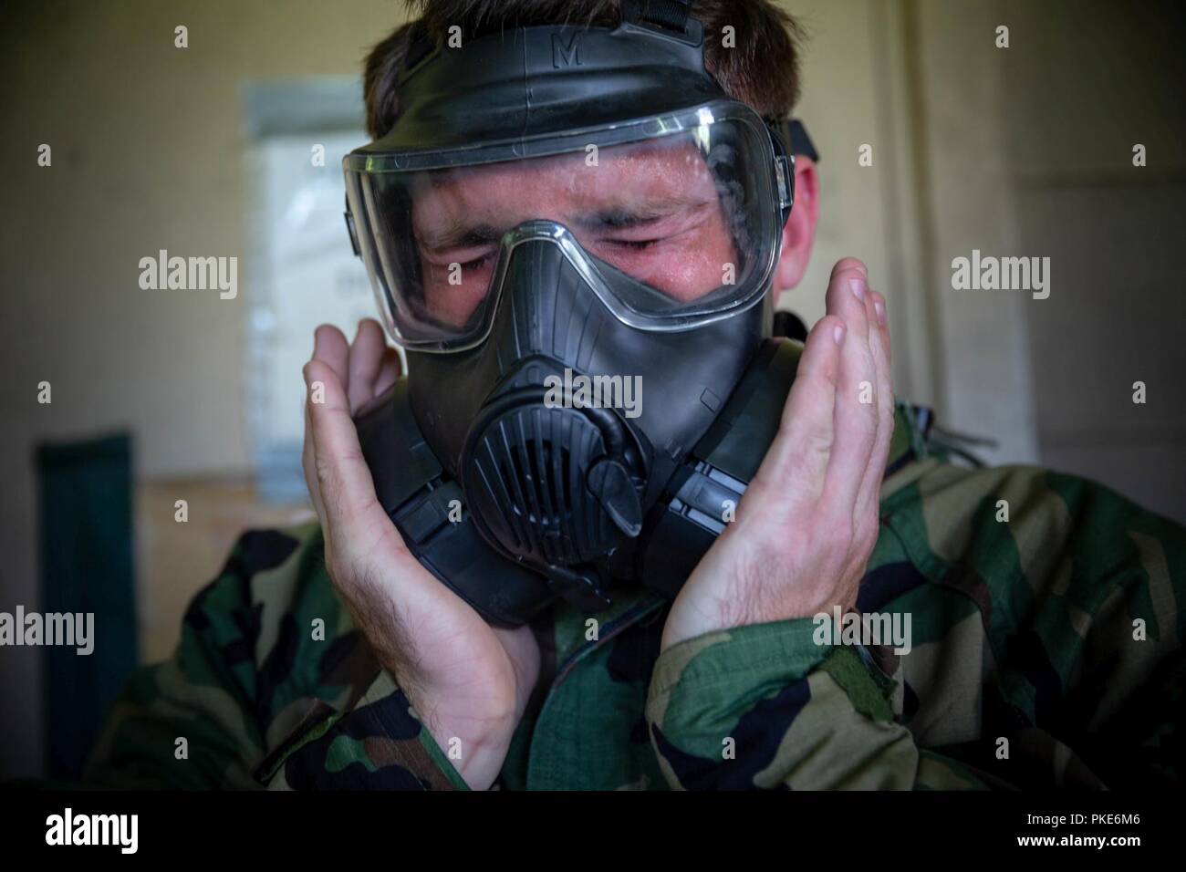 A U.S. Marine clears his M50 joint service general purpose mask during ...