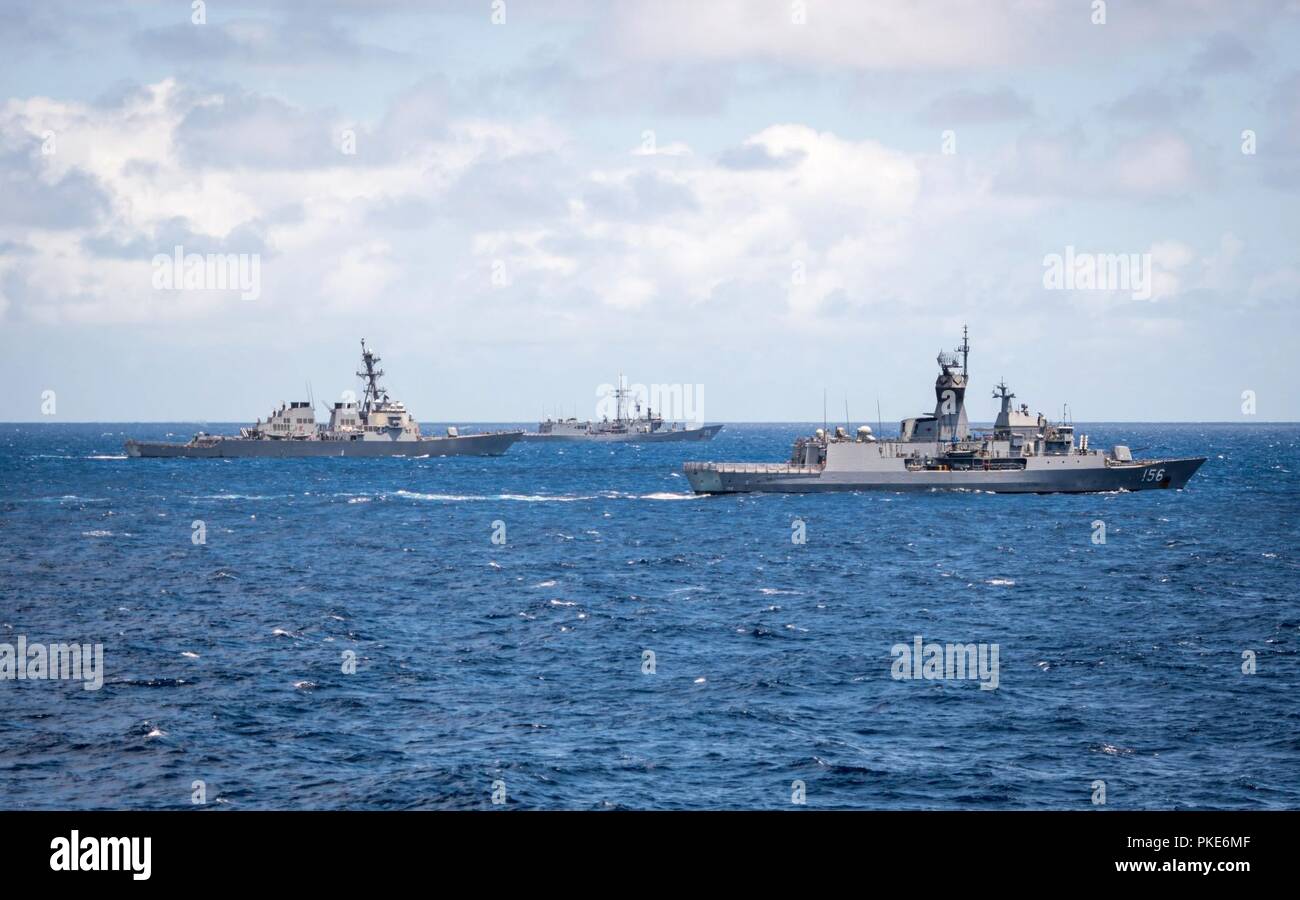 PACIFIC OCEAN (July 26, 2018) – From left, guided-missile destroyer USS ...
