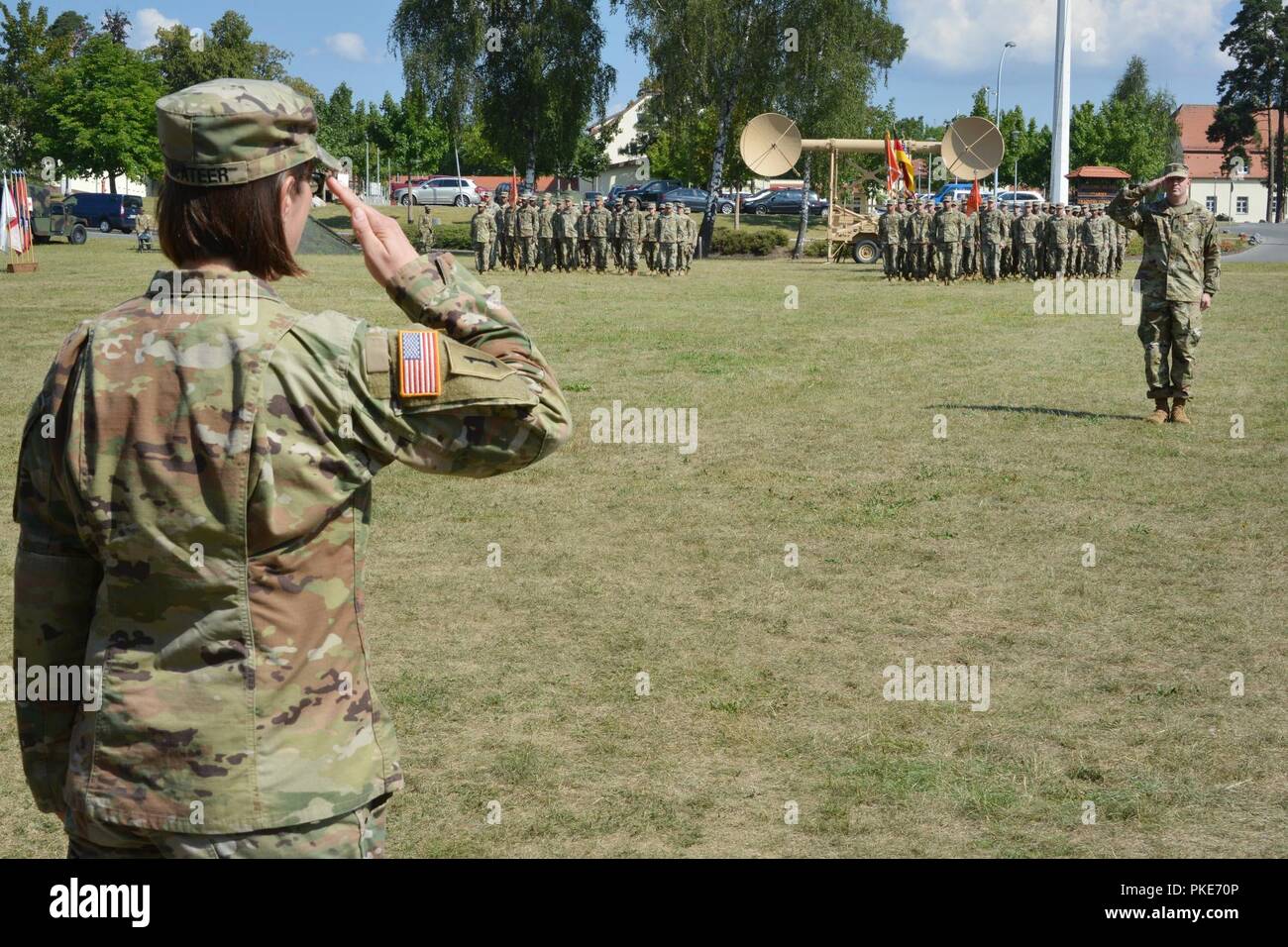The 44th Expeditionary Signal Battalion Commander U.S. Army Lt. Col. Heather McAteer, left, and ...