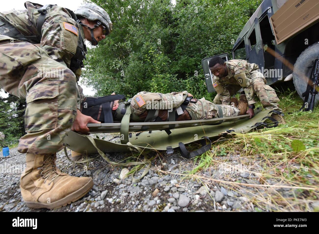 U.S. Army Spc. Inook Cho (left) from Charlie Company, 725th Brigade ...