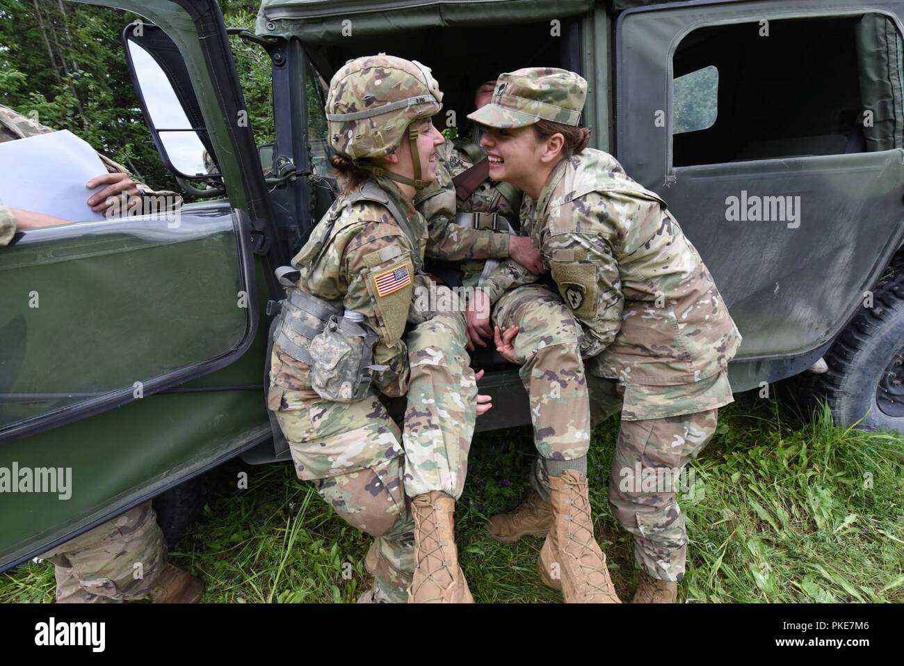 U.S. Army Sgt. Jennifer Delgado (left) and Spc. Harley Wallace (right ...