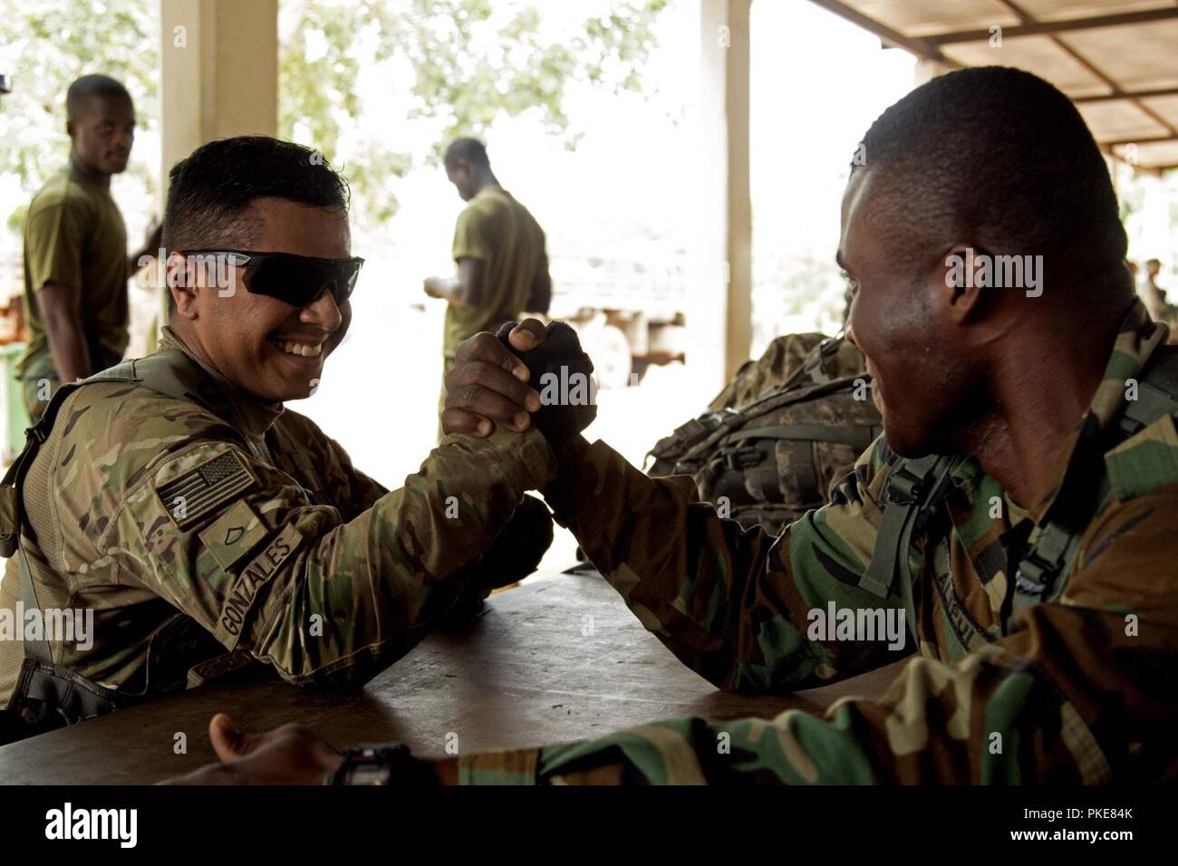 Soldiers from 36th Engineer Brigade and Ghana Armed Forces arm wrestle ...