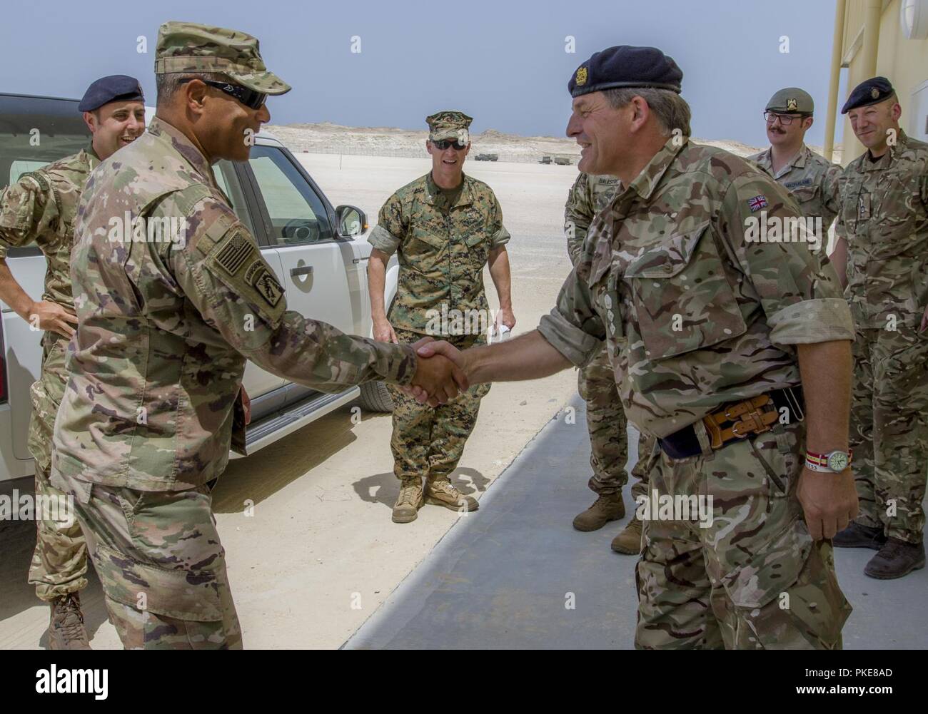 British Army Col. David Bennett greets U.S. Army Lt. Gen. Michael X ...