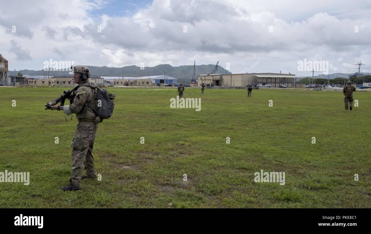 Sailors attached to Explosive Ordnance Disposal Mobile Unit (EODMU) 5 ...