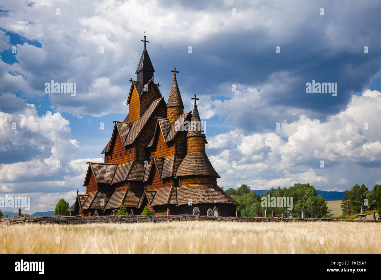Dramatic sky over the 13th century wooden Heddal Stave Church, the ...