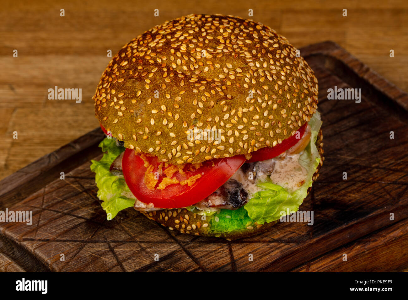 Tasty burger with meat and cheese Stock Photo - Alamy