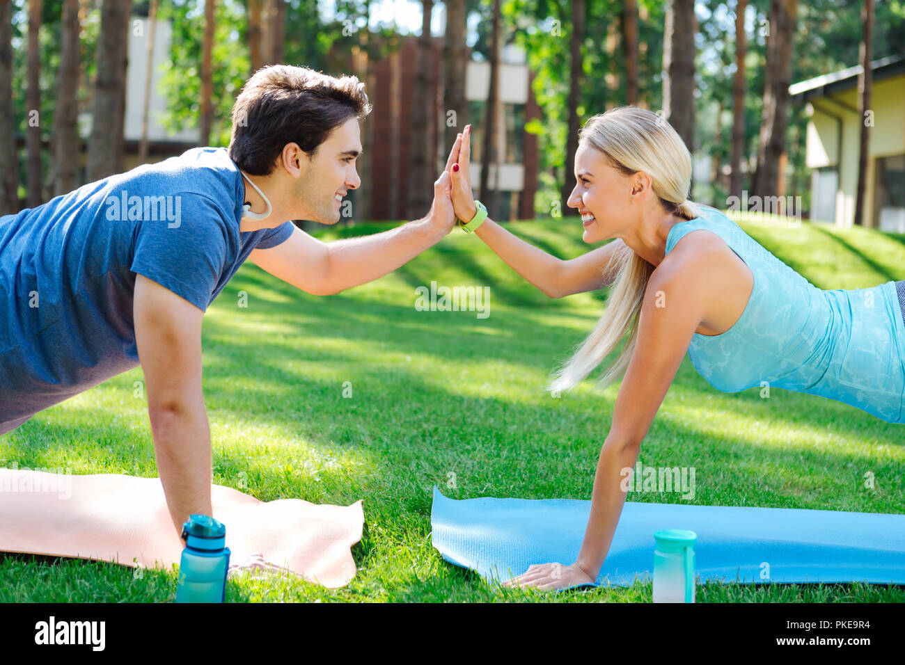 Delighted positive couple being opposite each other Stock Photo - Alamy