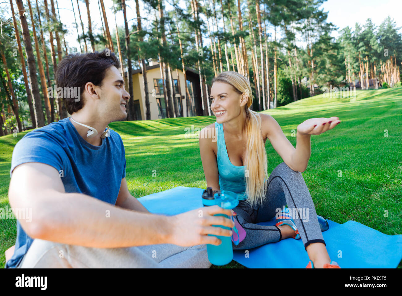 Joyful delighted people having a nice conversation Stock Photo - Alamy