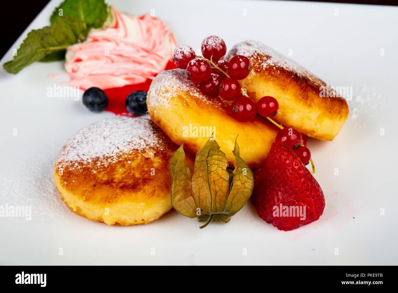 Cottage Cheese pan cakes with berries Stock Photo - Alamy