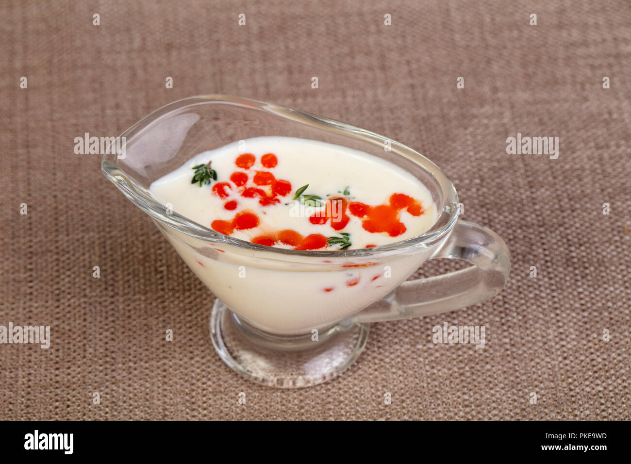 Cream sauce with red caviar Stock Photo - Alamy