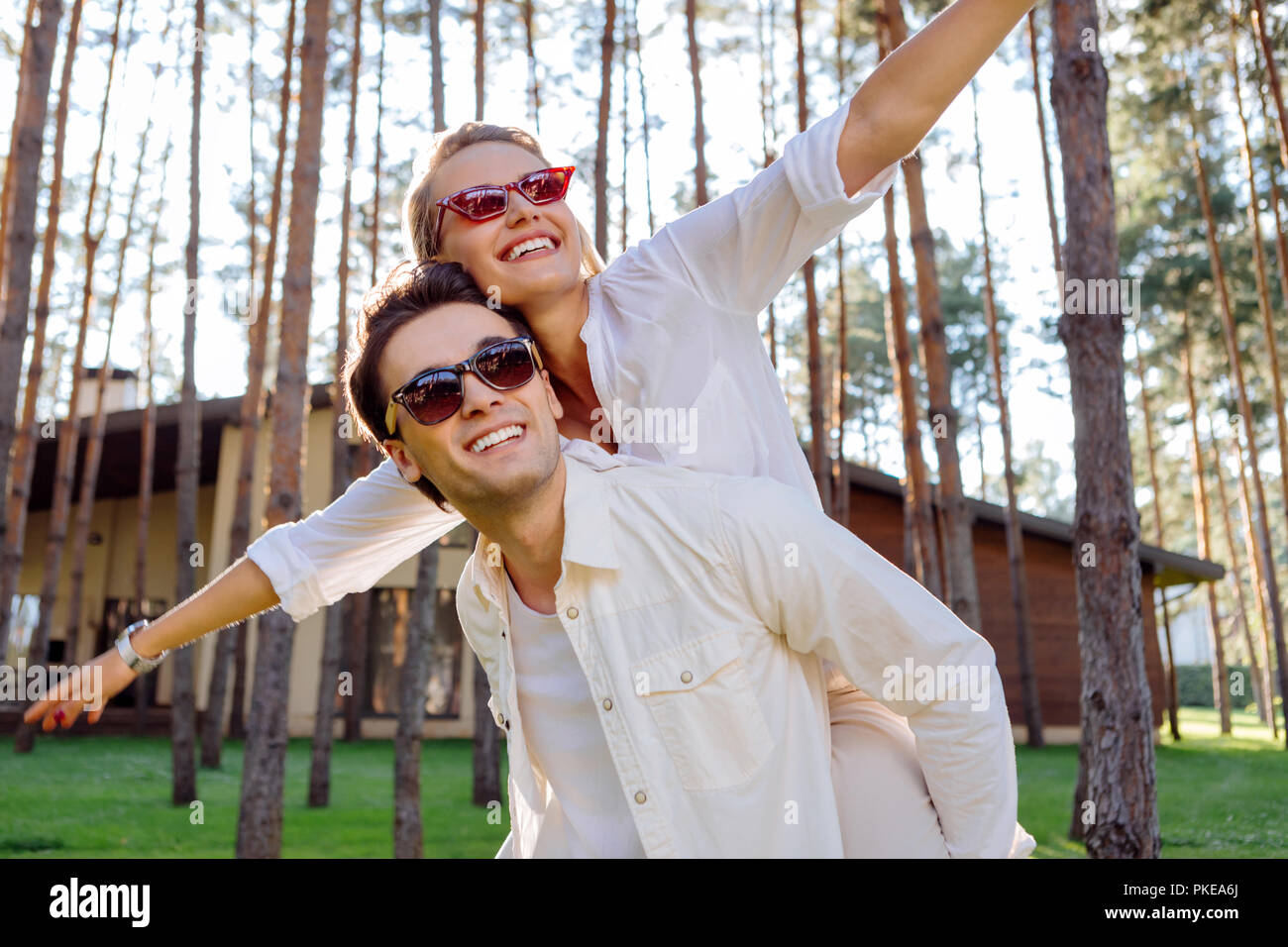 Happy joyful couple being in a perfect mood Stock Photo - Alamy