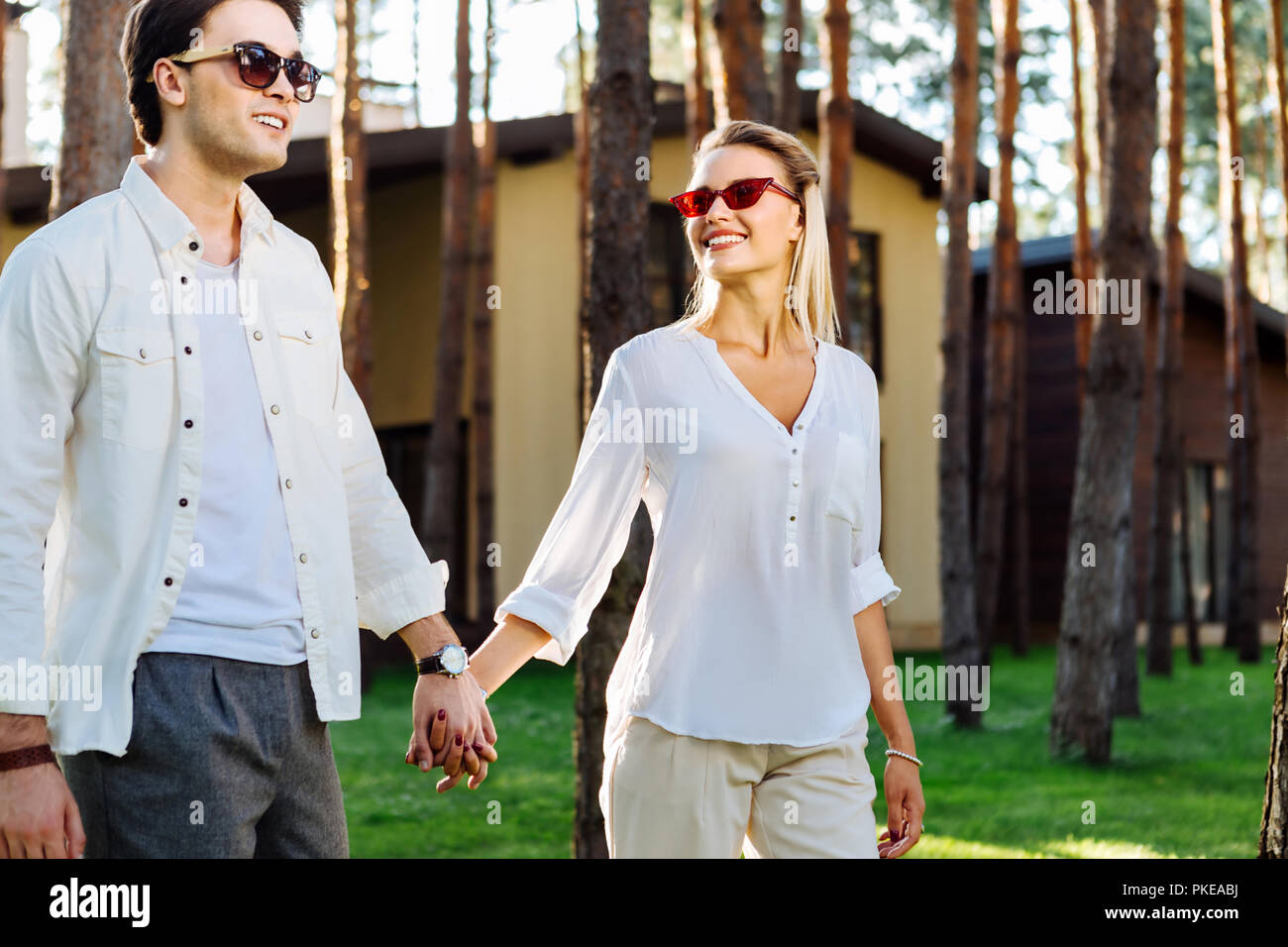 Joyful happy nice couple having a great day Stock Photo - Alamy