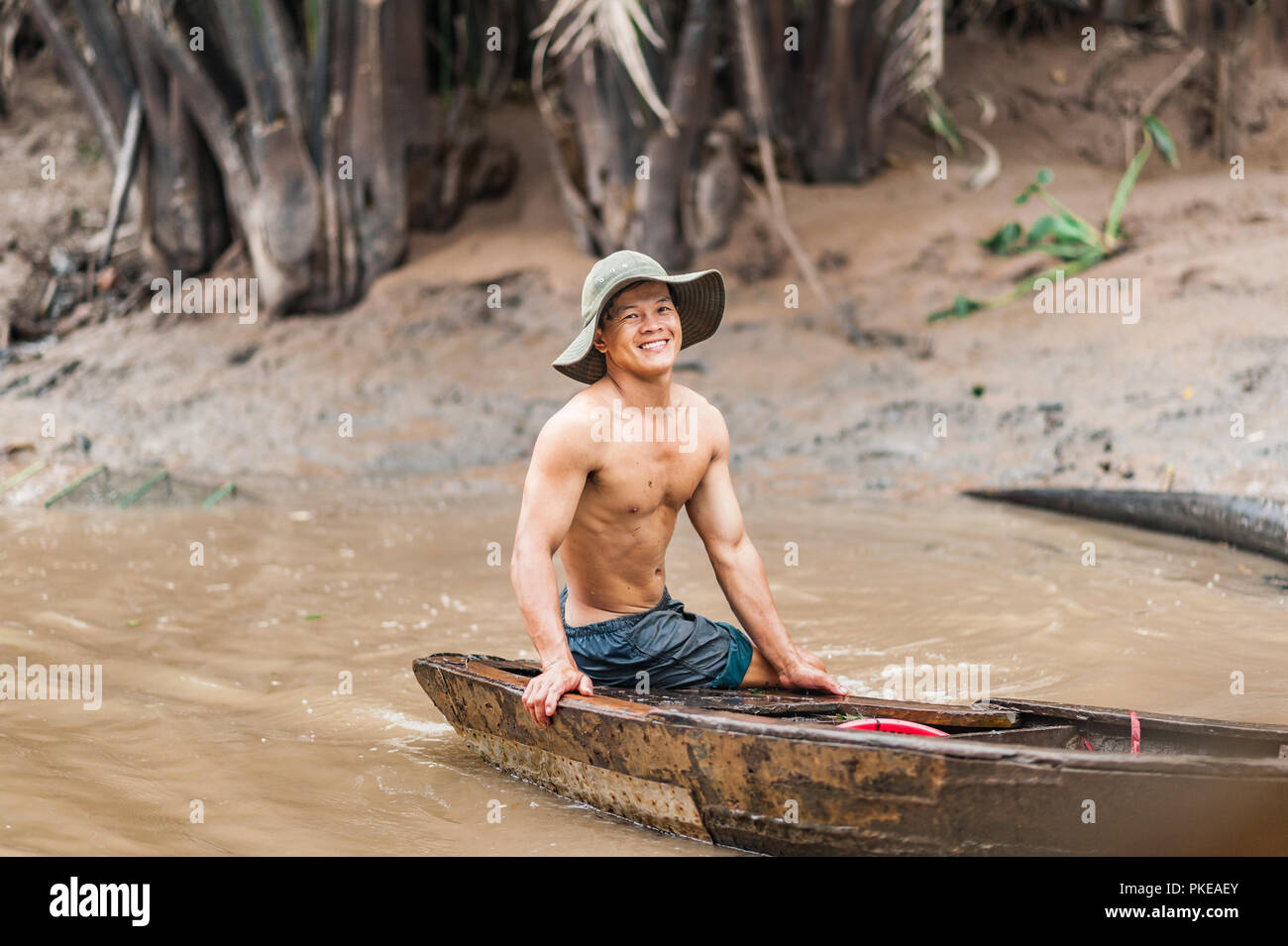 Vietnam man boat mangrove hi-res stock photography and images - Alamy