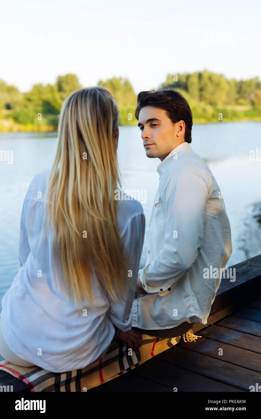 Positive nice young couple enjoying nature together Stock Photo - Alamy