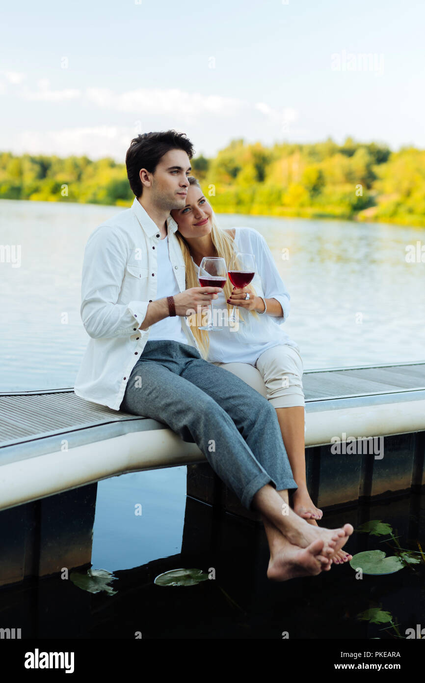 Positive happy couple dreaming together about their future Stock Photo ...