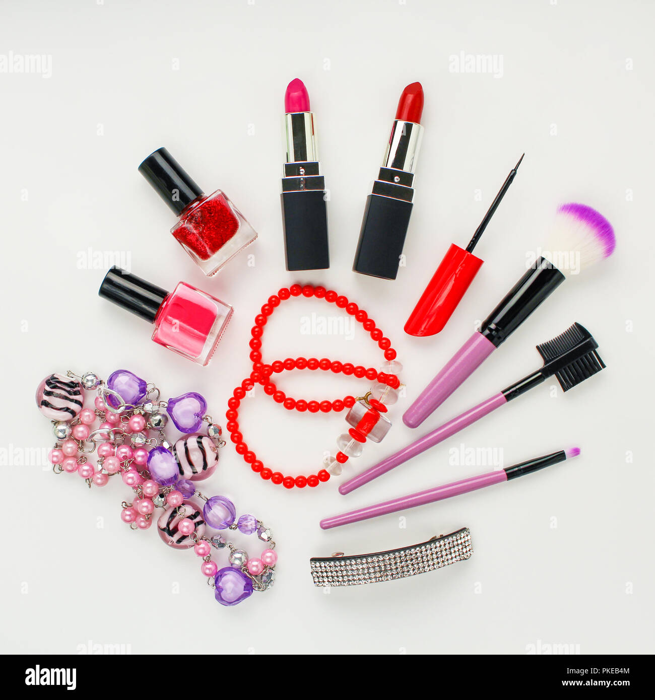 Women's accessories and cosmetics on white background Stock Photo - Alamy