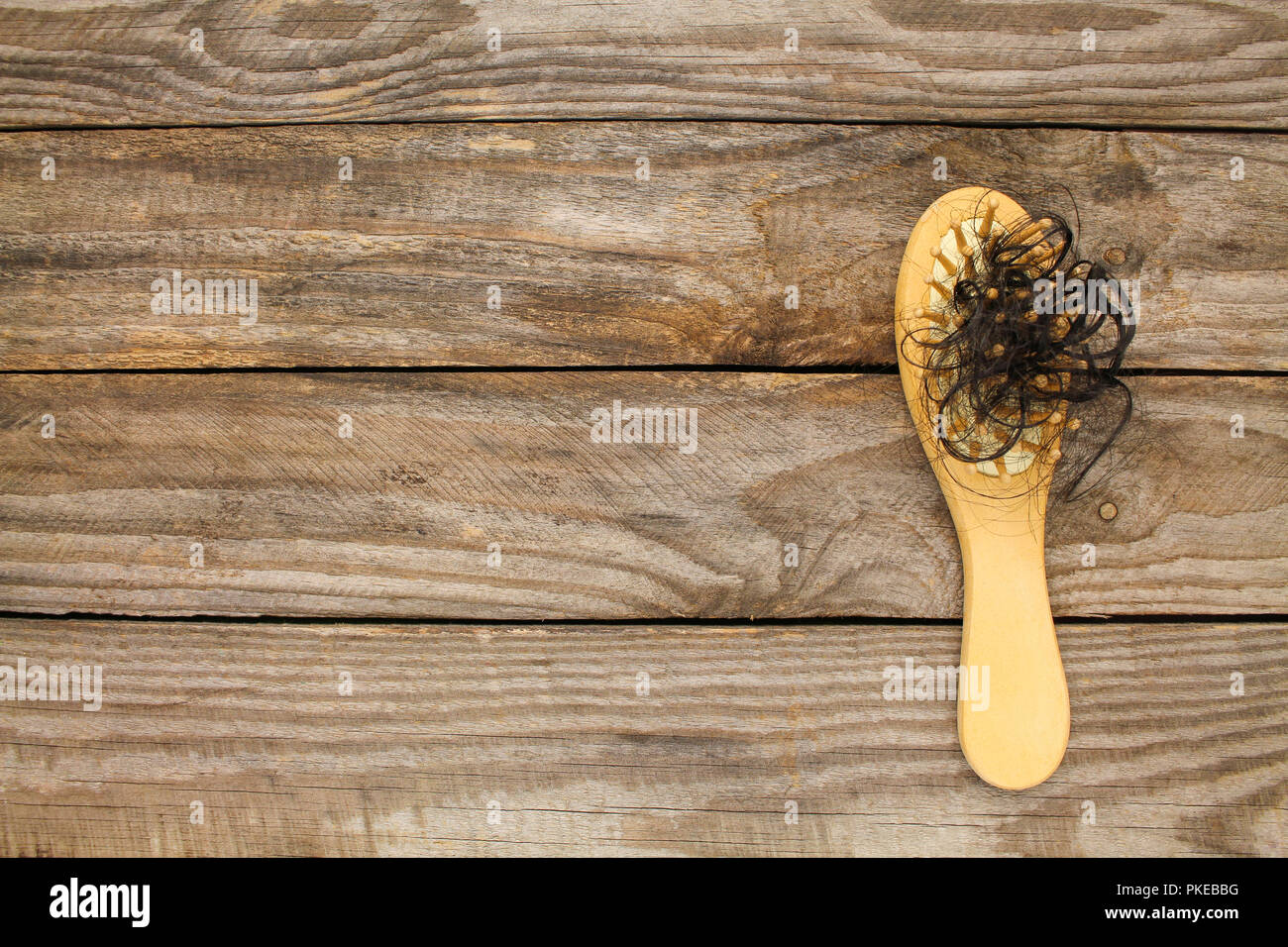 Fallen hair on comb on table. Top view Stock Photo - Alamy