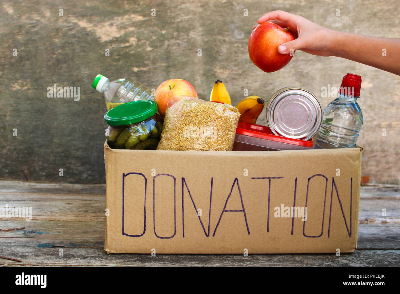 Food donation box children hi-res stock photography and images - Alamy