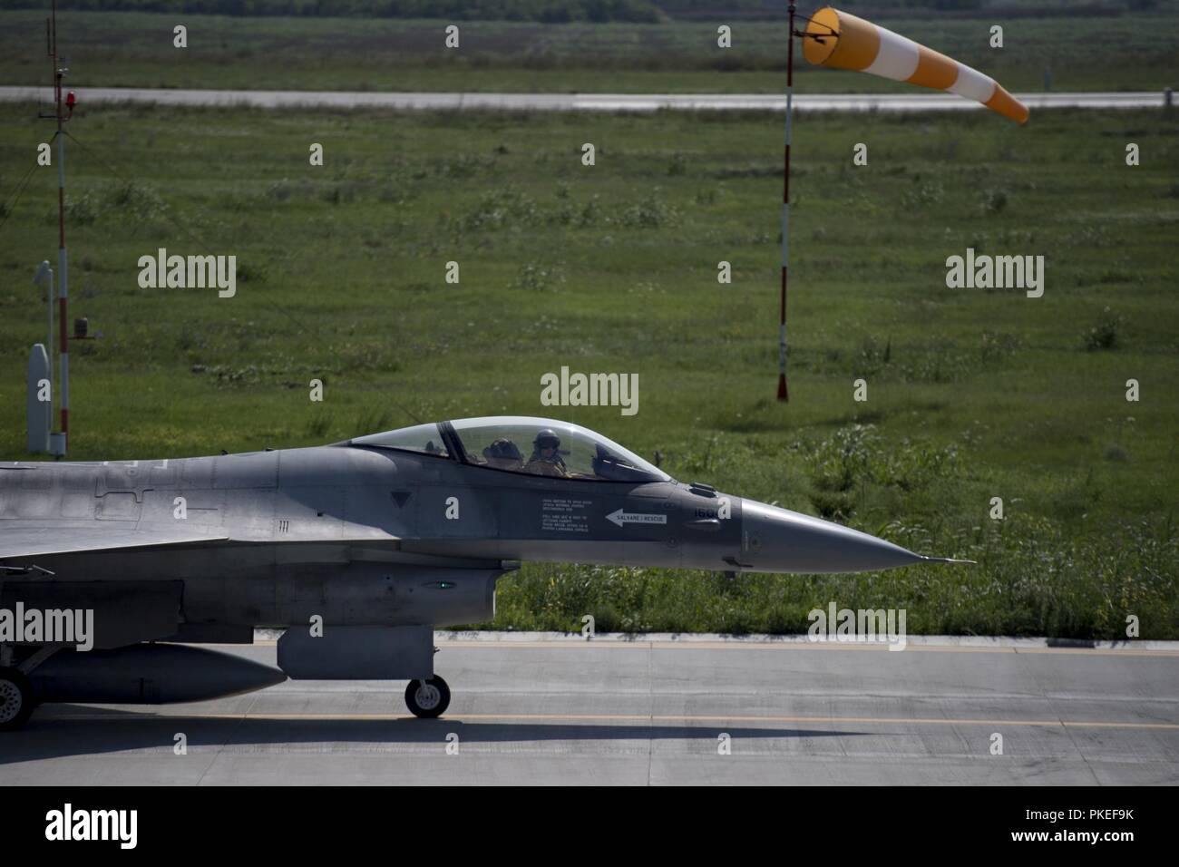 A Romanian air force pilot prepares to take off in an F-16 Fighting ...