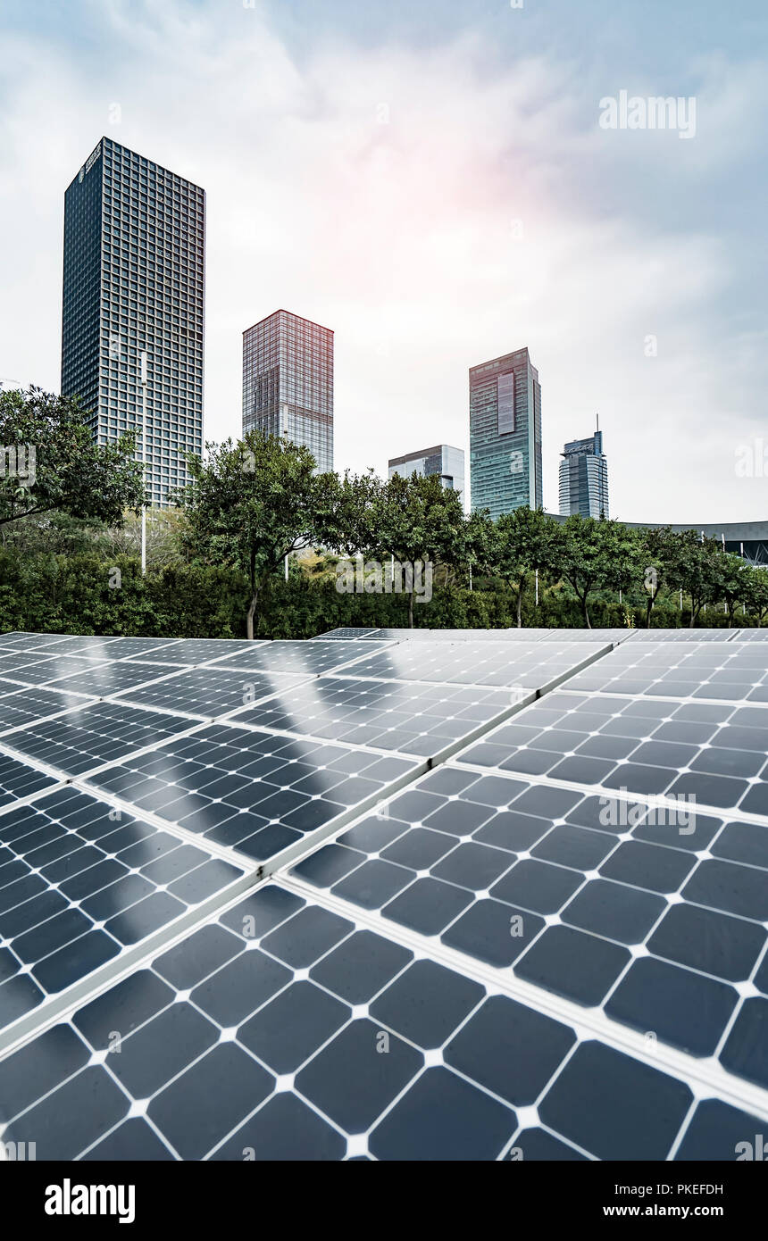 Solar Panels In The Park Of Modern City Stock Photo - Alamy