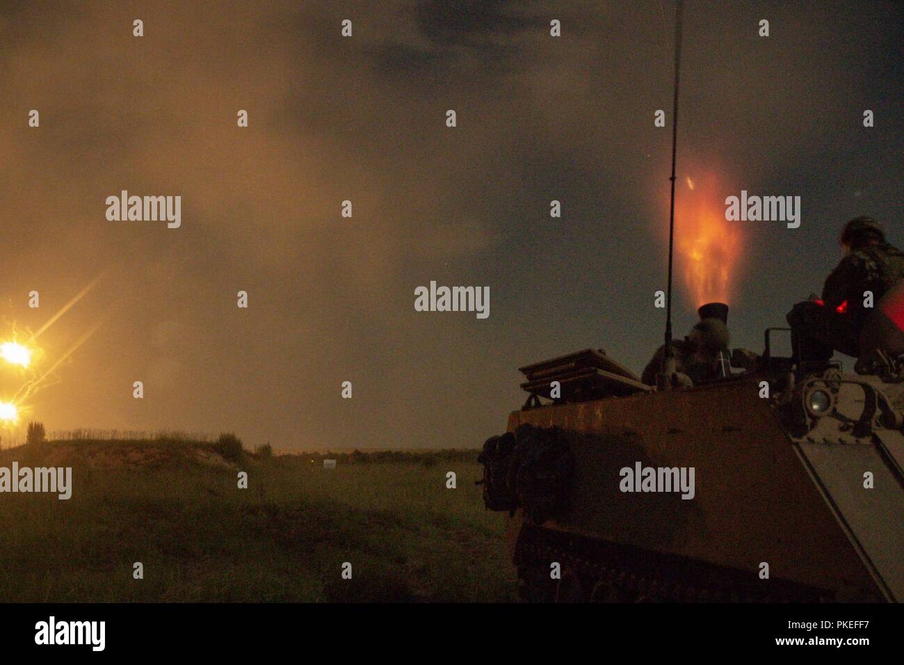 From left to right: Gunner Spc. Edward Tovatt, Assistant Gunner Pfc ...