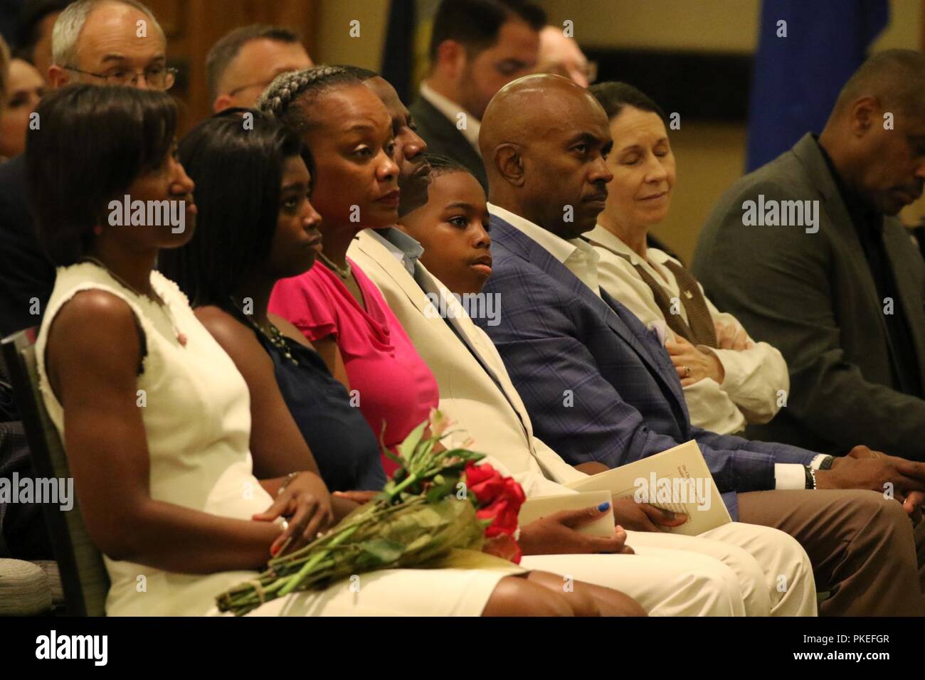 Family of outgoing commander Col. Calvin C. Hudson II attend the Fort ...