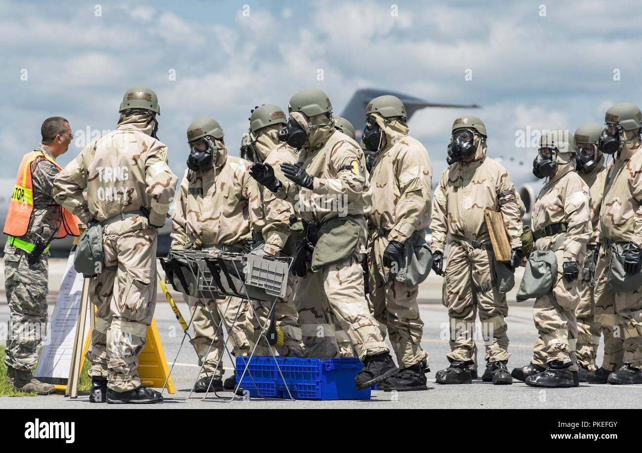 Team Dover members simulate going through a decontamination line in ...