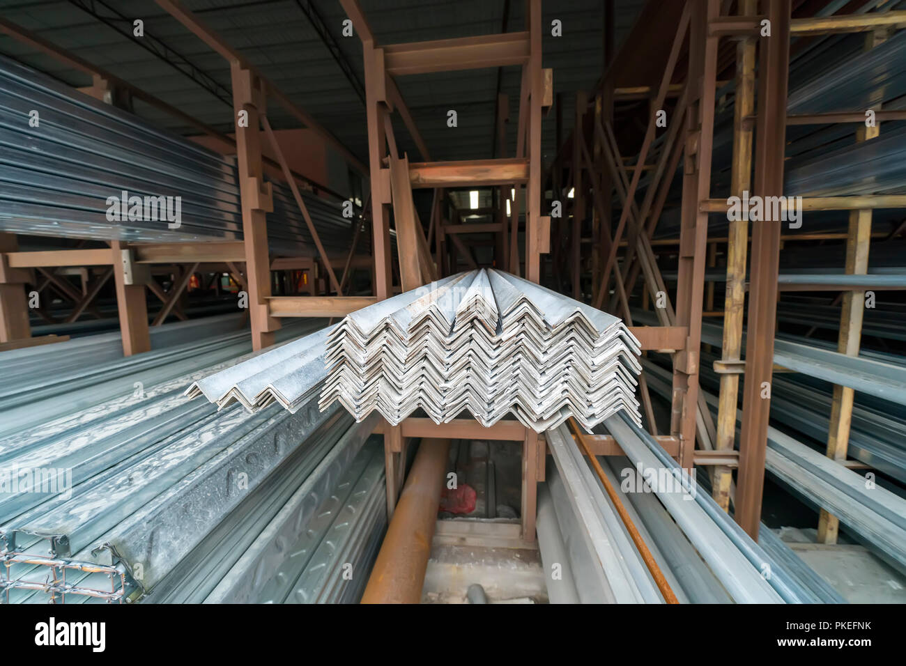Steel angle on the rack in shop Stock Photo - Alamy