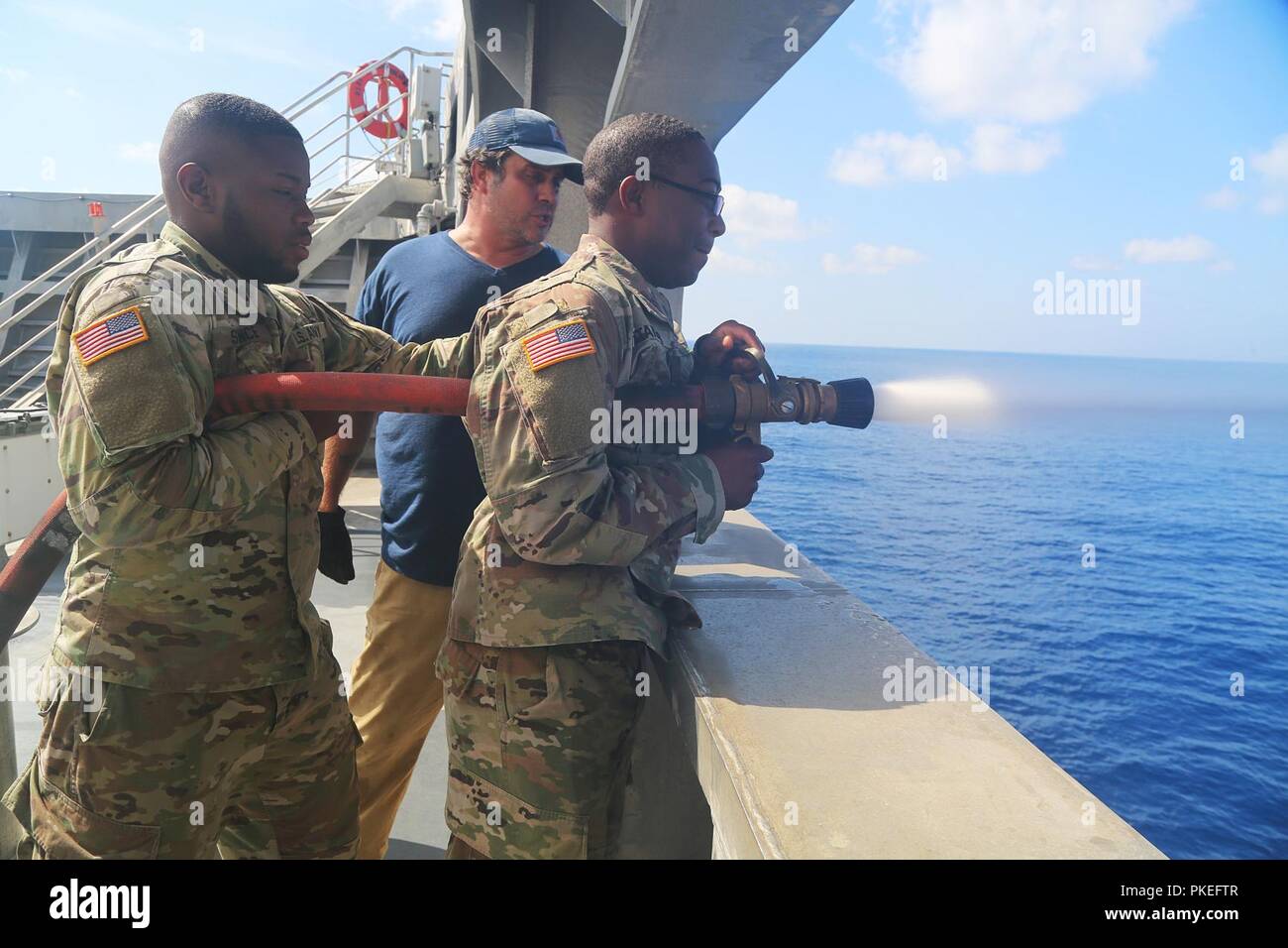 U.S. Army Spc. Javon Spence (left) and Pfc. James Whitaker, 55th Signal ...
