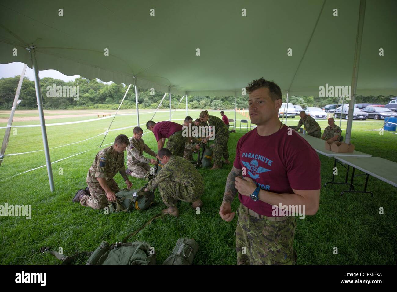A Canadian Jumpmaster gives instructions on the operations of an MC-1 ...