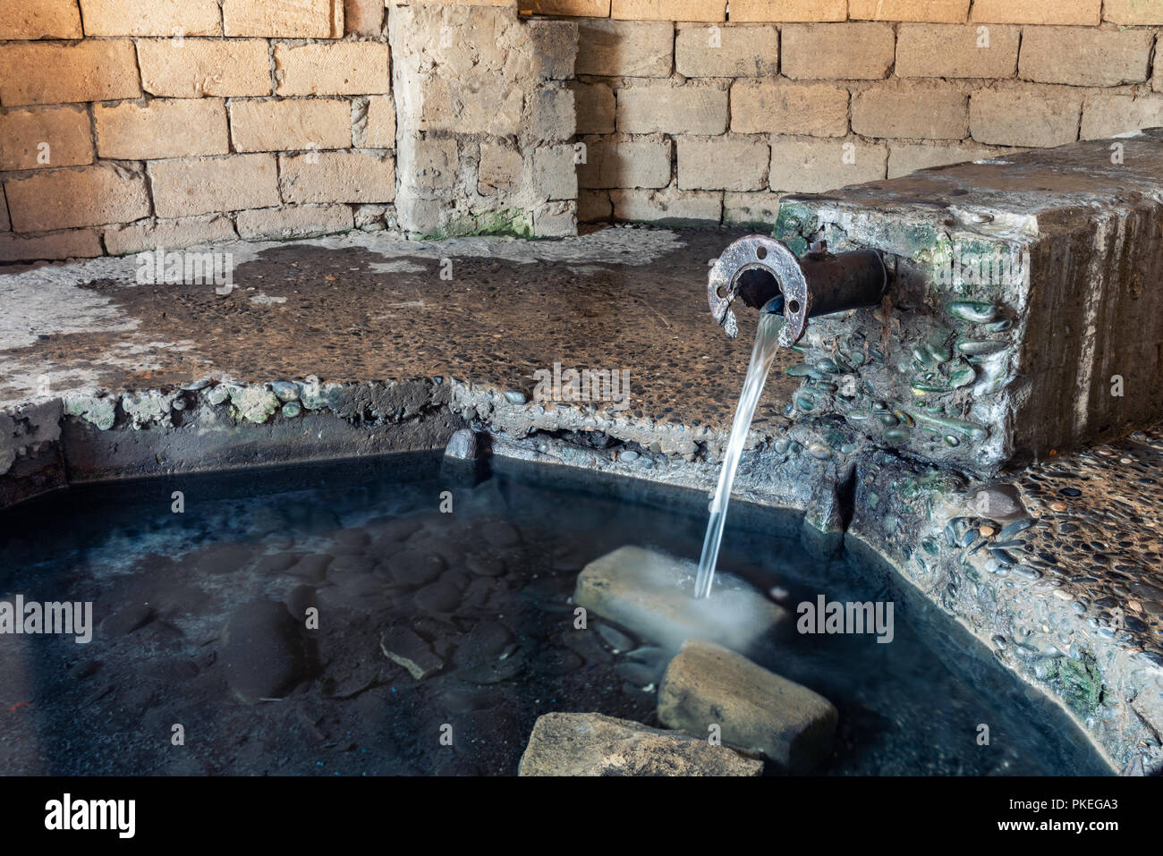 A holy spring with healing water Stock Photo - Alamy