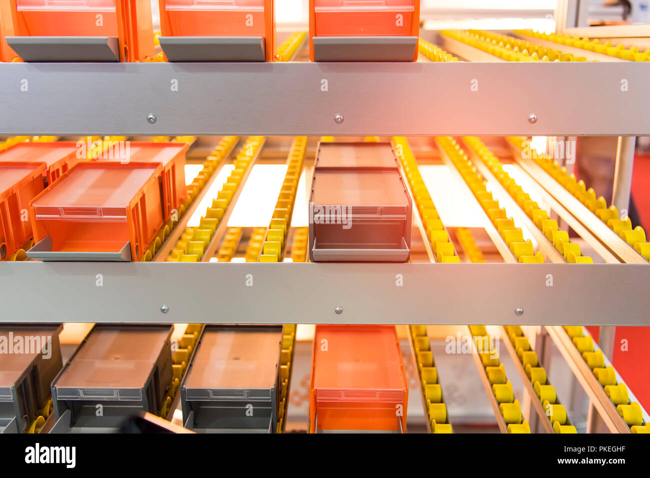 Plastic boxes on the roller conveyor. Modern warehouse equipment Stock ...