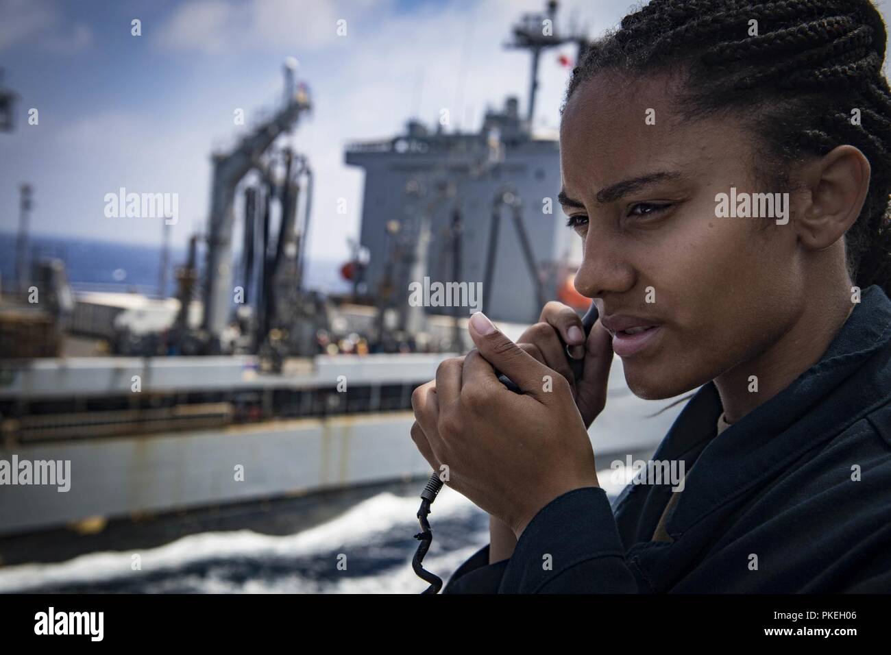 SEA (Aug. 3, 2018) Ensign Paris Smith stands watch on the starboard ...