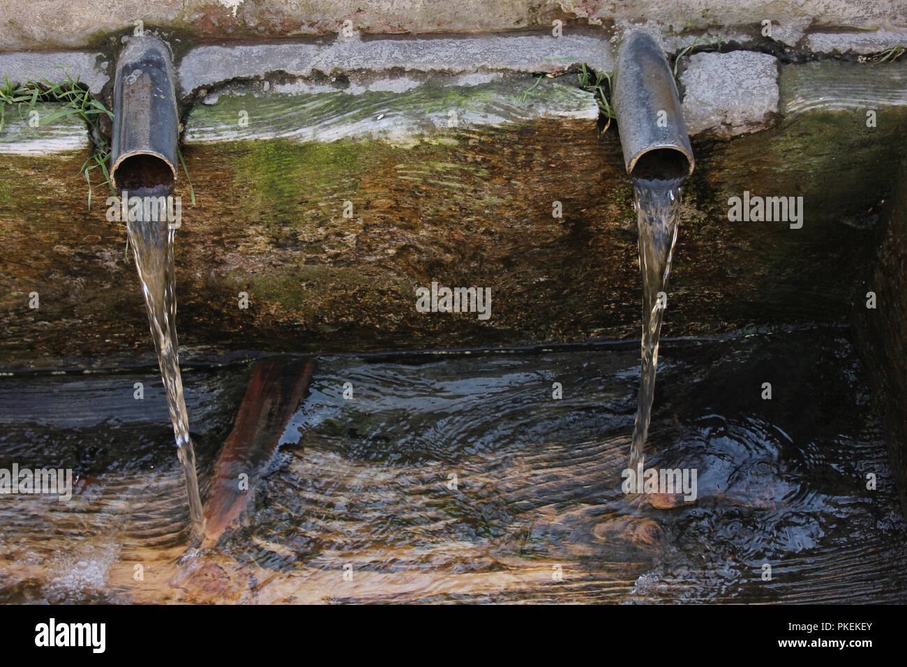 Water pipe outlet fountain flow hi-res stock photography and images - Alamy