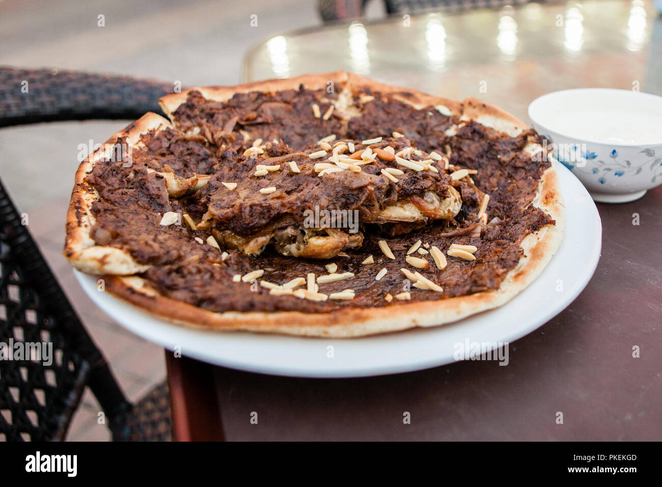 A plate of musakhan at a cafe in Dubai, United Arab Emirates. Musakhan ...