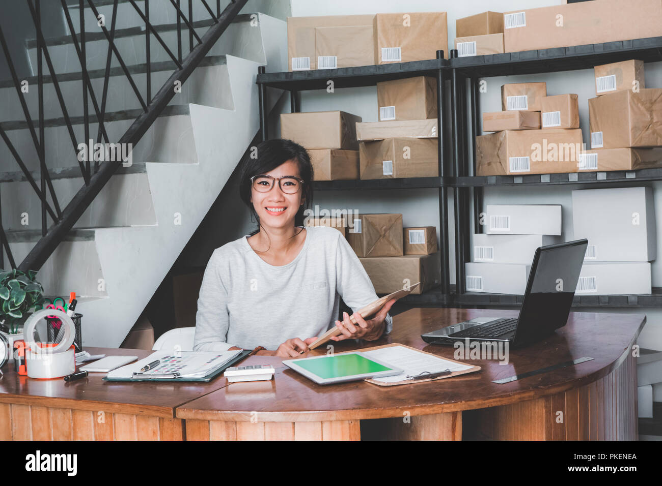 package delivery service office Stock Photo - Alamy