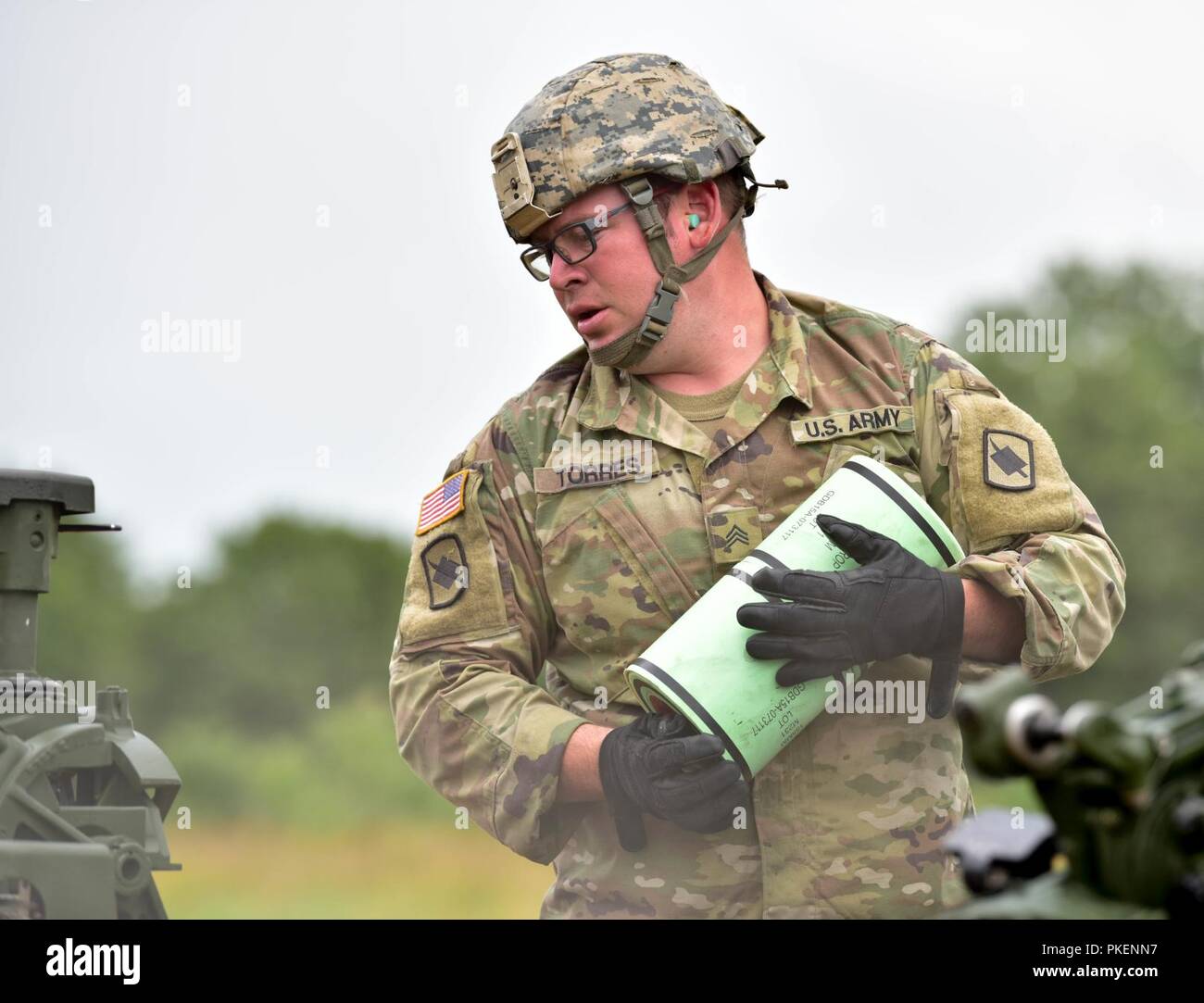 Sergeant Andrew Torres, a soldier assigned to Charlie Battery, 1st ...