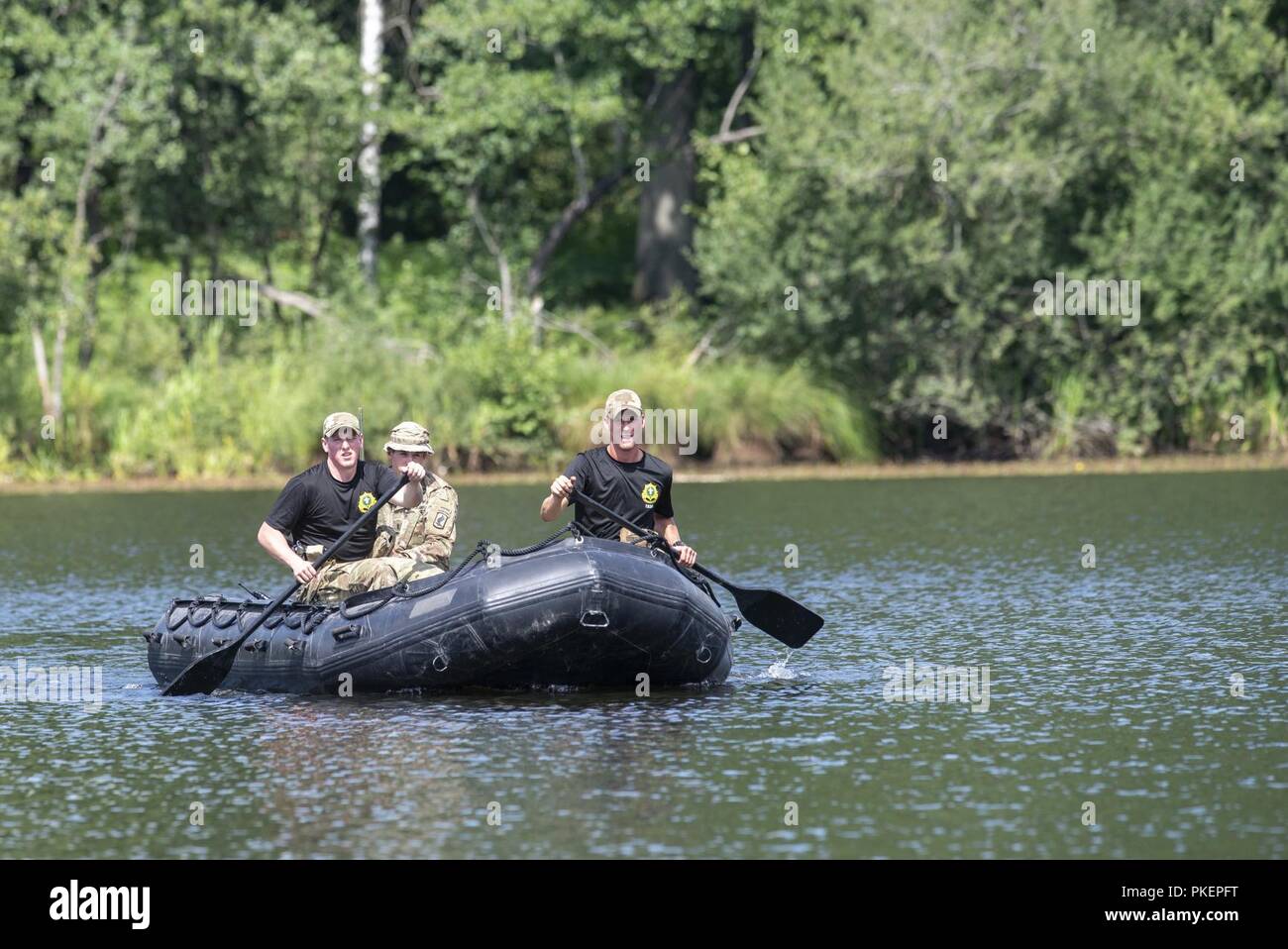 Sniper team from the 2nd Calvary Regiment, return to the boat landing ...