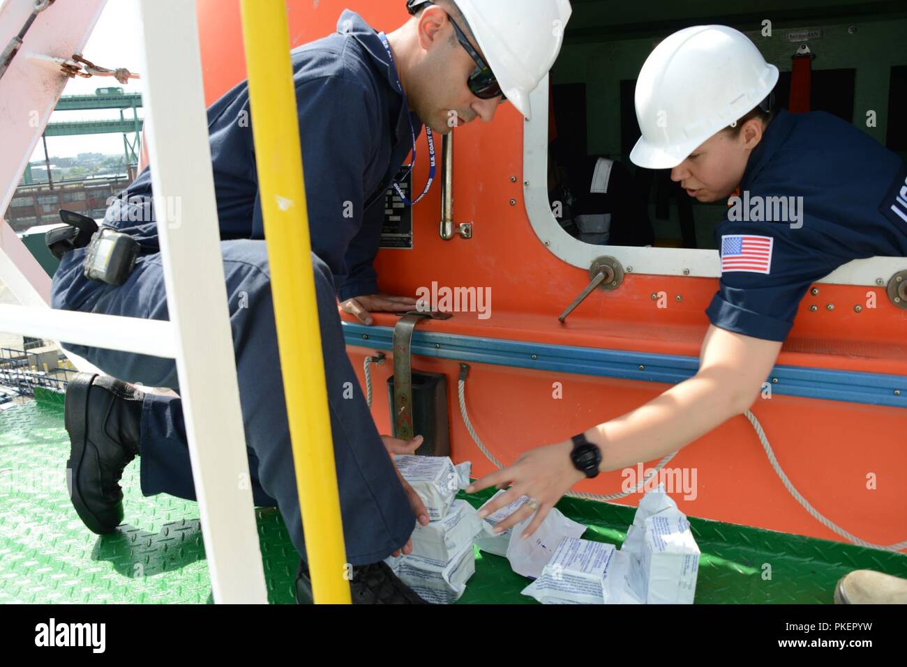 Lt. j.g. James Mitard and Lt. j.g. Hannah Gribbin, members of the U.S ...
