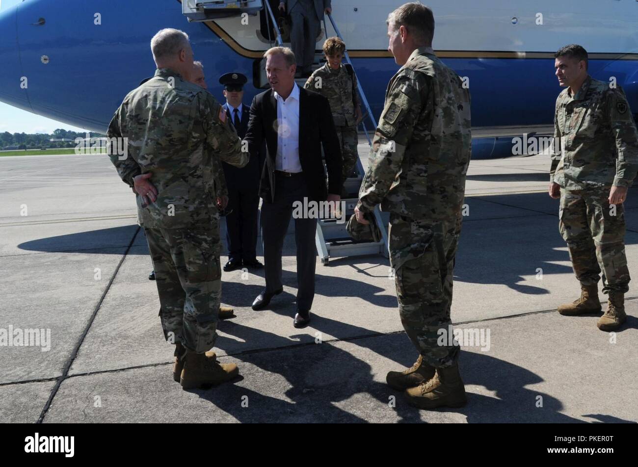 U.S. Deputy Secretary of Defense Patrick M. Shanahan greets Army Gen. Robert B. Abrams ...