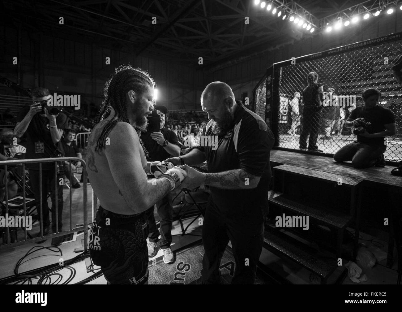 Mixed martials arts athletes, fight during the Legacy Fighting Alliance ...