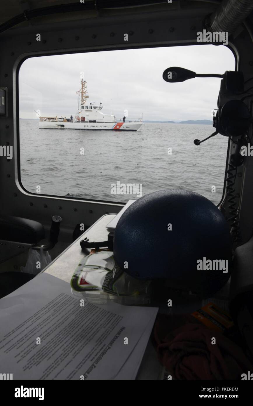 The crew of the Coast Guard Cutter Terrapin, an 87-foot patrol boat ...