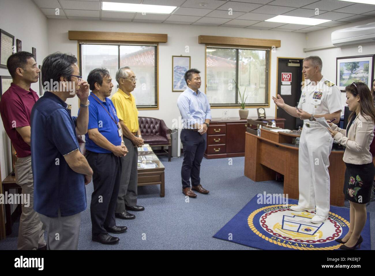 OKINAWA, Japan (August 1, 2018) Capt. Robert Mathewson (right ...