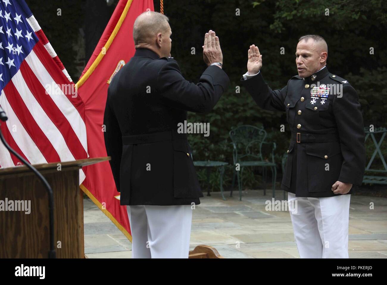 Commandant of the Marine Corps Gen. Robert B. Neller, left, promotes ...